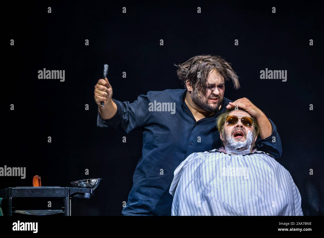 04 June 2024, Brandenburg, Cottbus: Nils Stäfe (Sweeney Todd, l) and ...