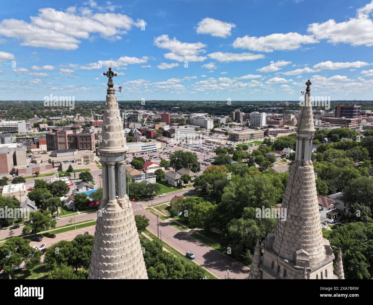 An aerial view of town skyline with two towering spires Stock Photo - Alamy