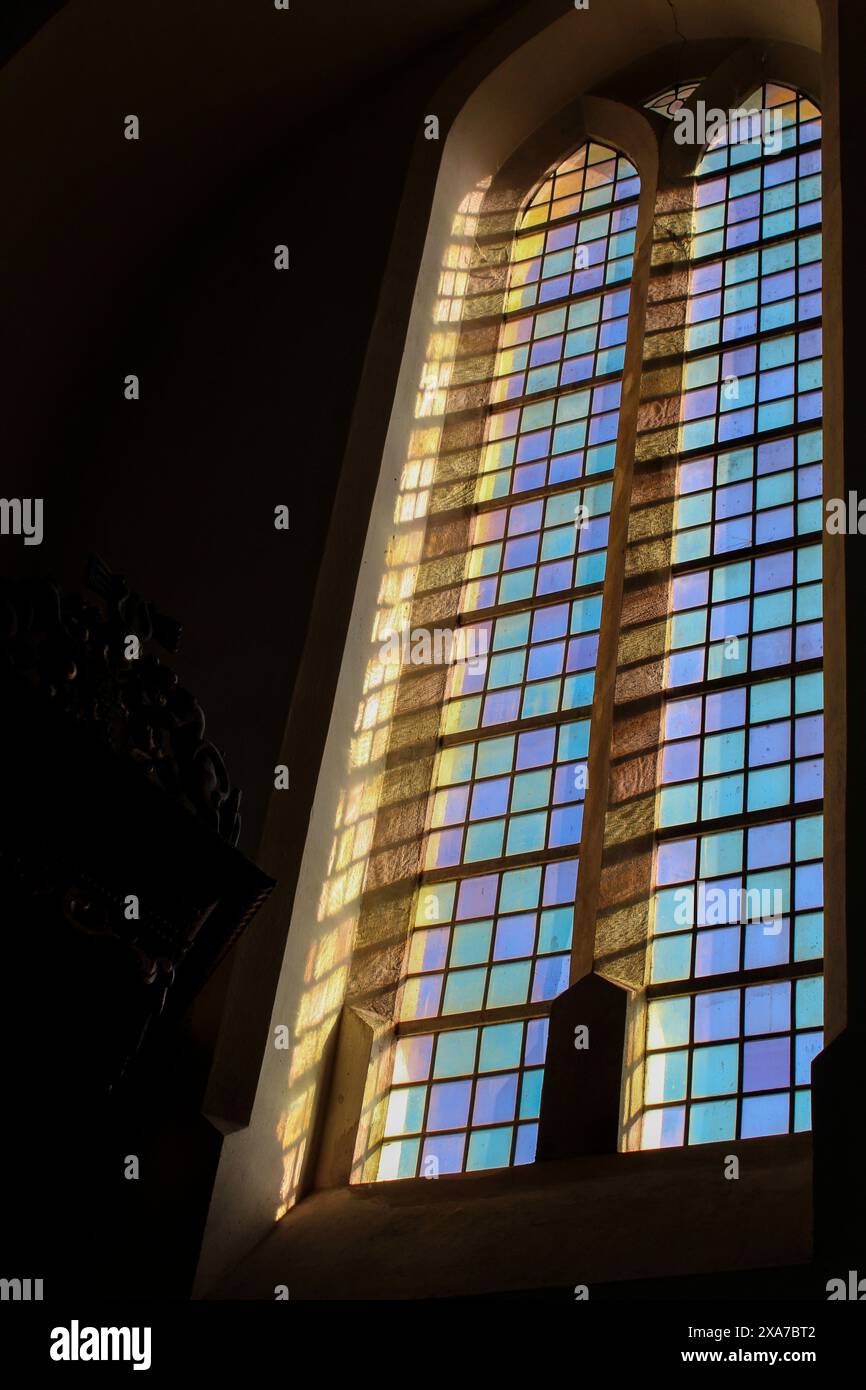 Sunlight illuminating cathedral windows in a radiant glow Stock Photo ...