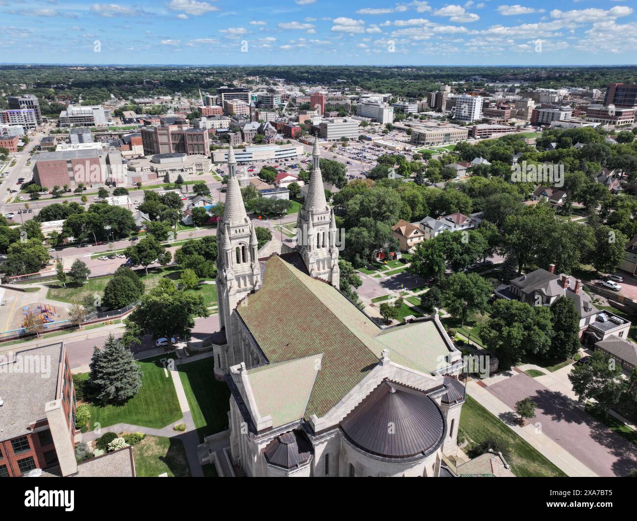 An aerial view of a cathedral, cityscape, and trees Stock Photo - Alamy