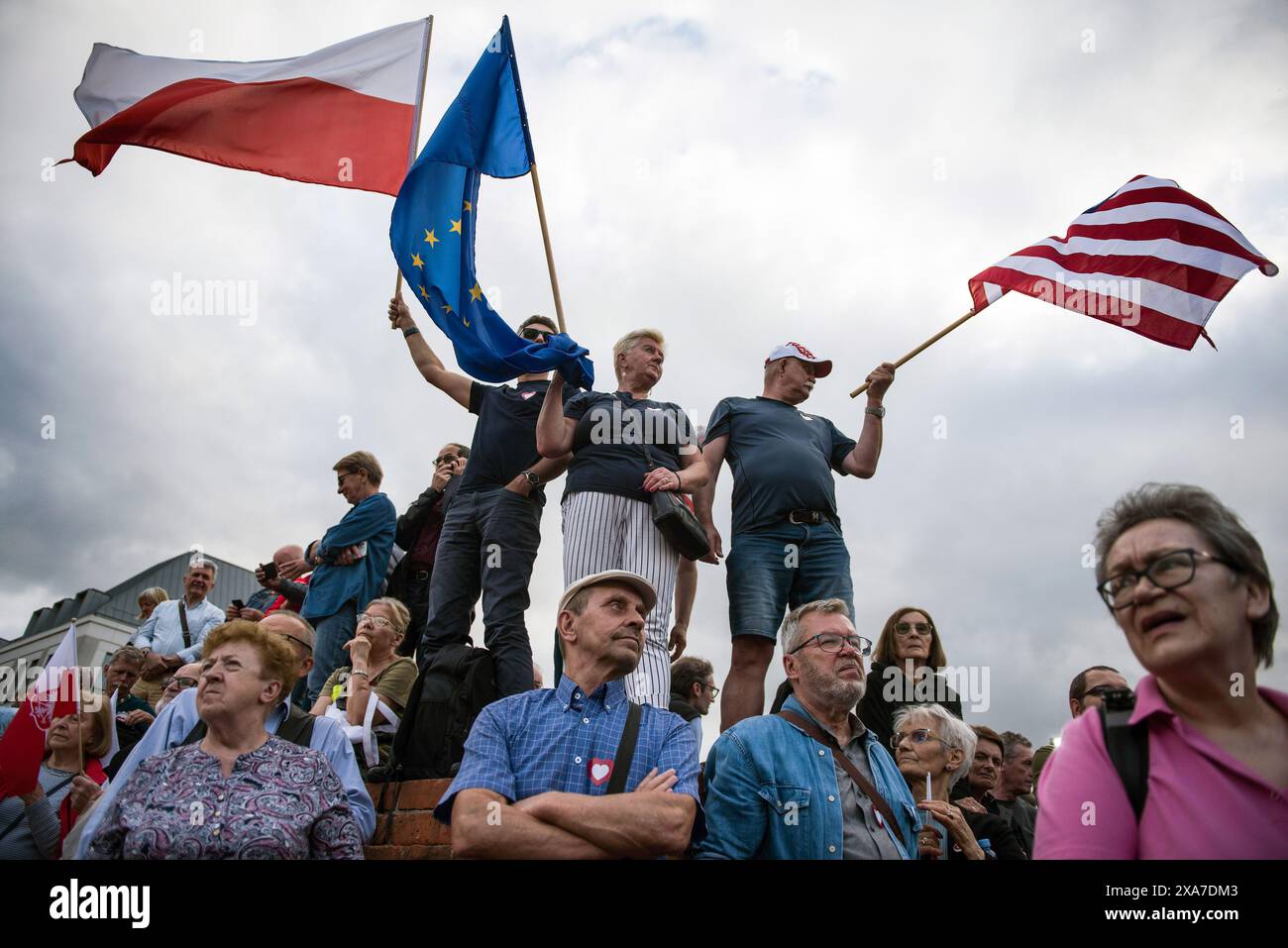 People wave Polish and EU flags during the pro-EU rally organised by ...