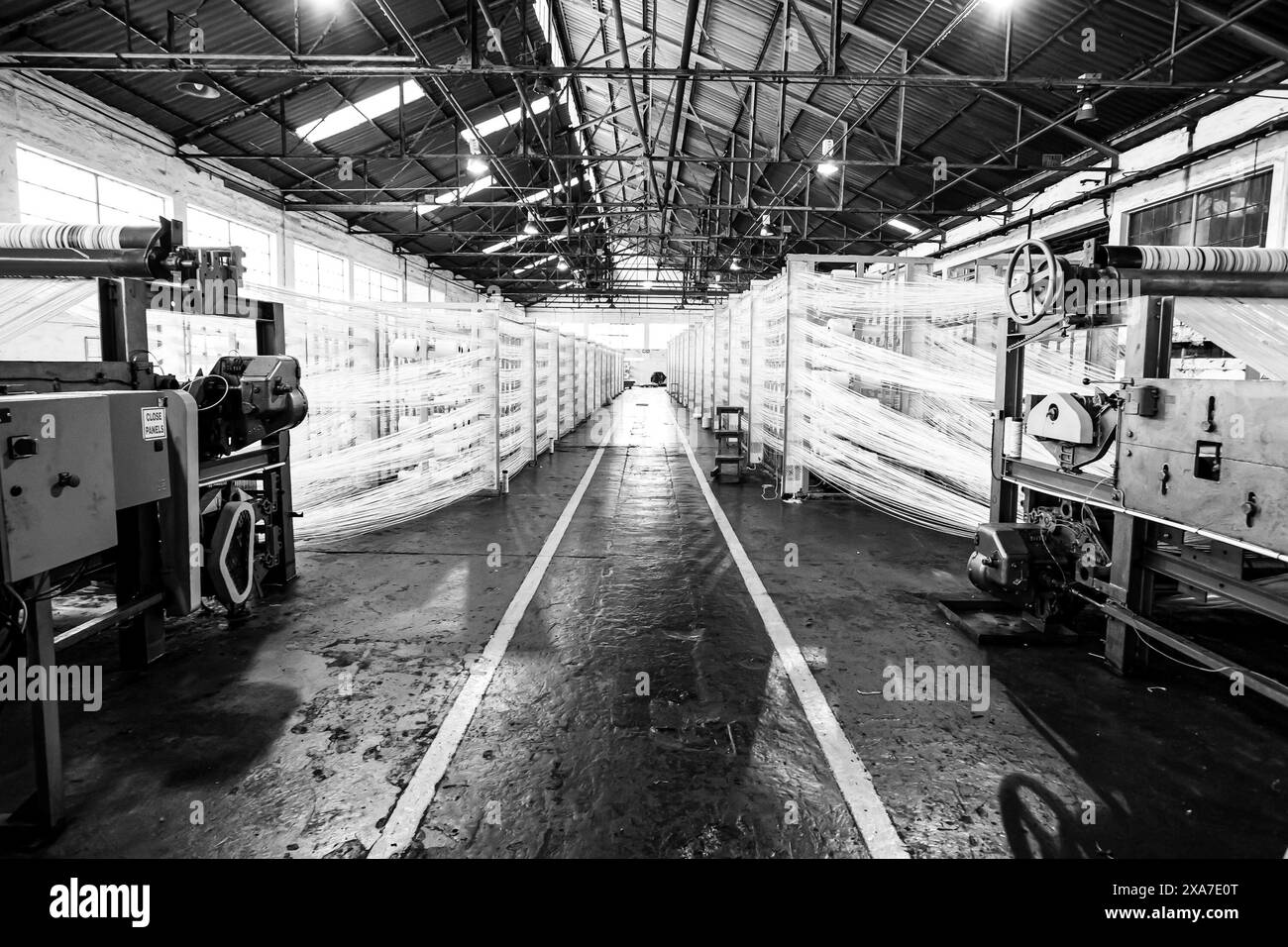 The cotton thread lines on a copwinder weft assembly line loom in ...