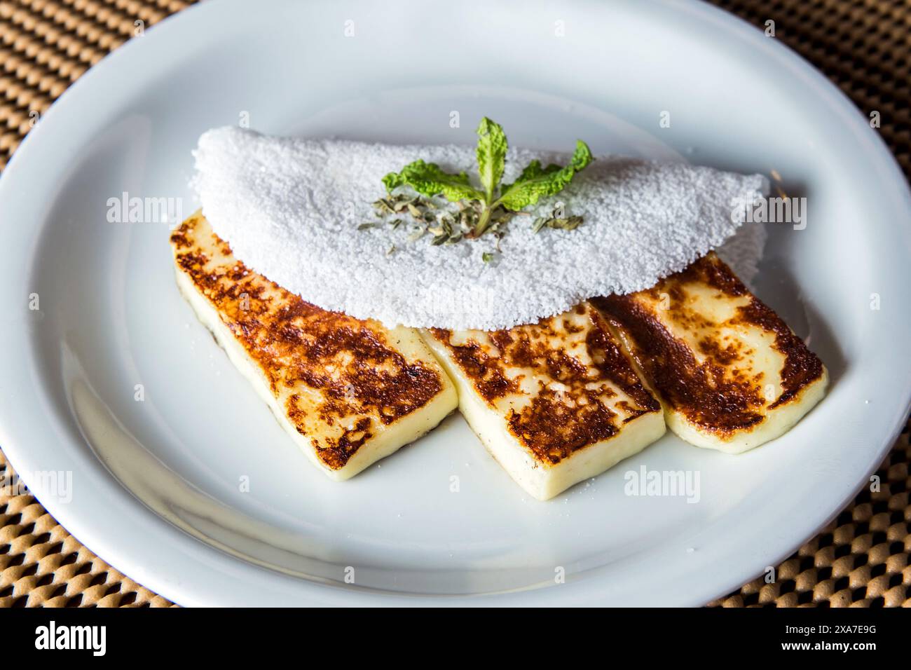 A traditional northeastern Brazilian food, tapioca stuffed with roasted ...