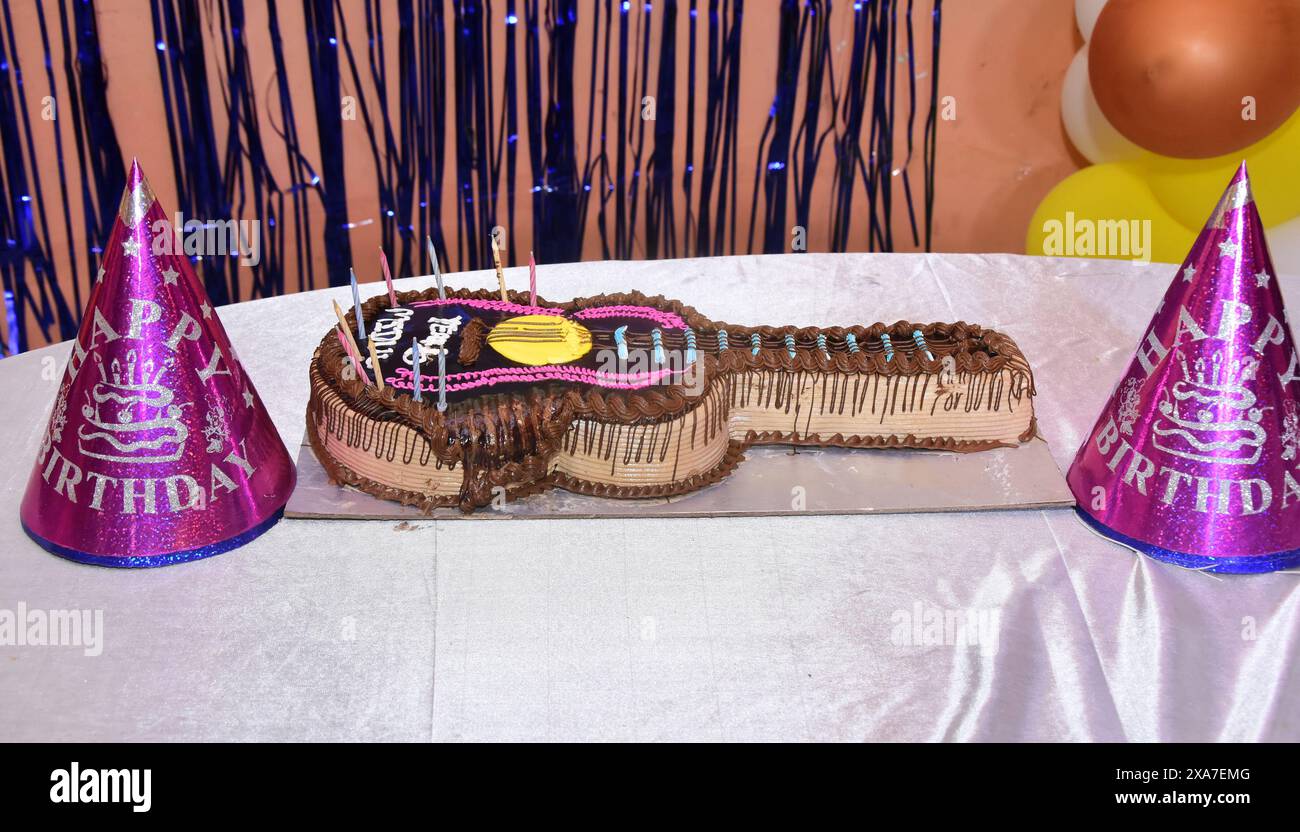 Birthday cake shaped like a hi-res stock photography and images - Alamy