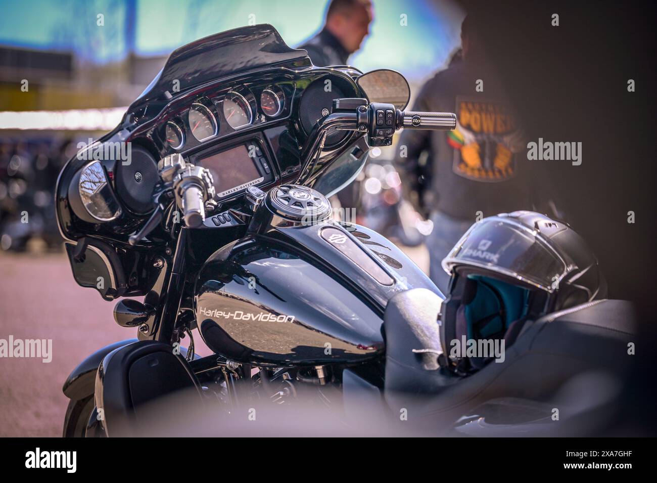 A close-up of a Harley Davidson motorcycle showcased at a biker event ...