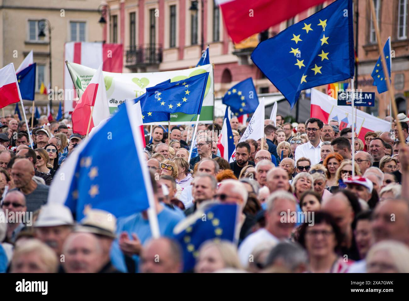 People wave Polish and EU flags during the pro-EU rally organised by ...