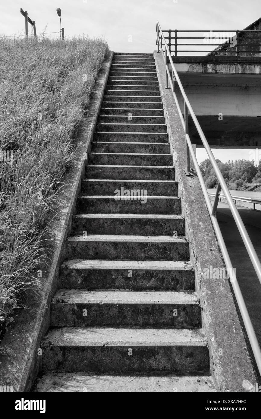 Concrete steps leading to the roof of a building in a straight line ...