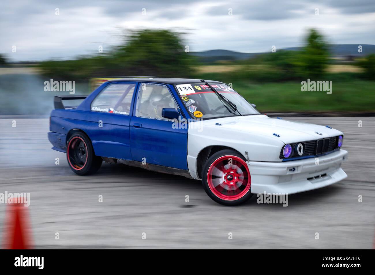 Car riding on asphalt road hi-res stock photography and images - Alamy