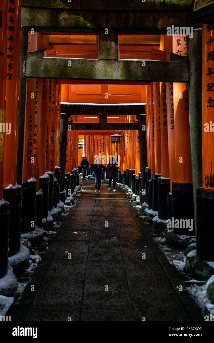 The Japanese people at Ancient style traditional Japanese torii tunnel ...