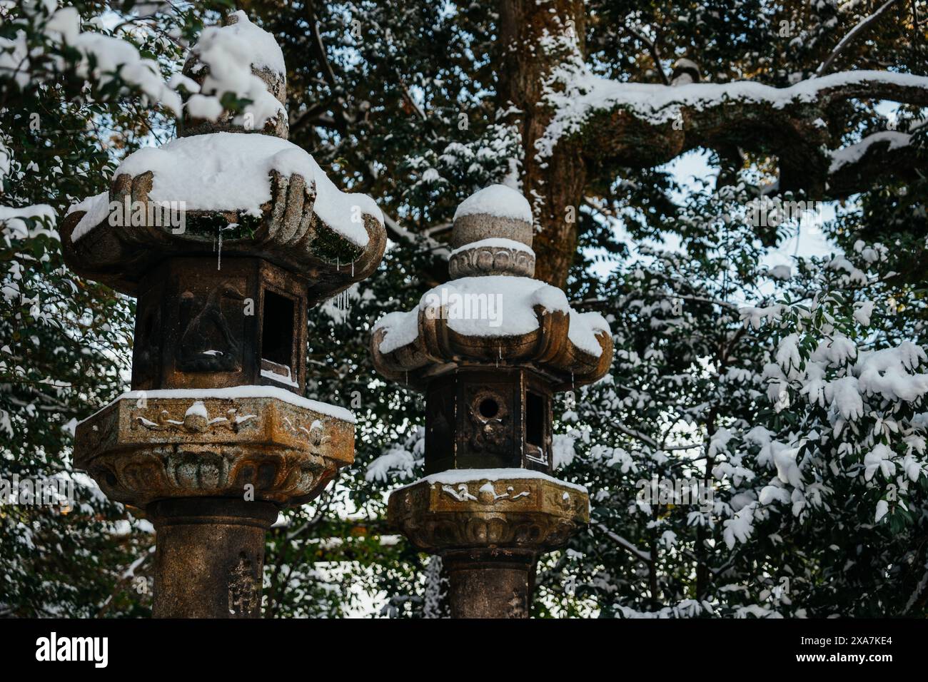The Ancient style traditional Japanese lantern covered in rare winter ...