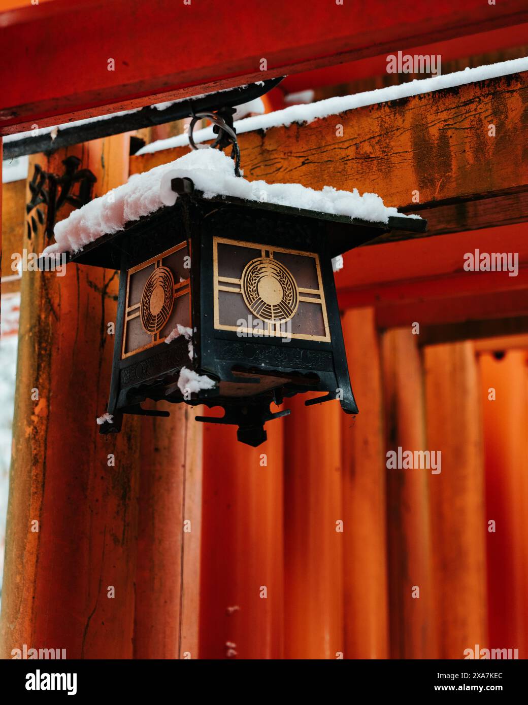 An Ancient style traditional Japanese lanern covered in rare winter ...