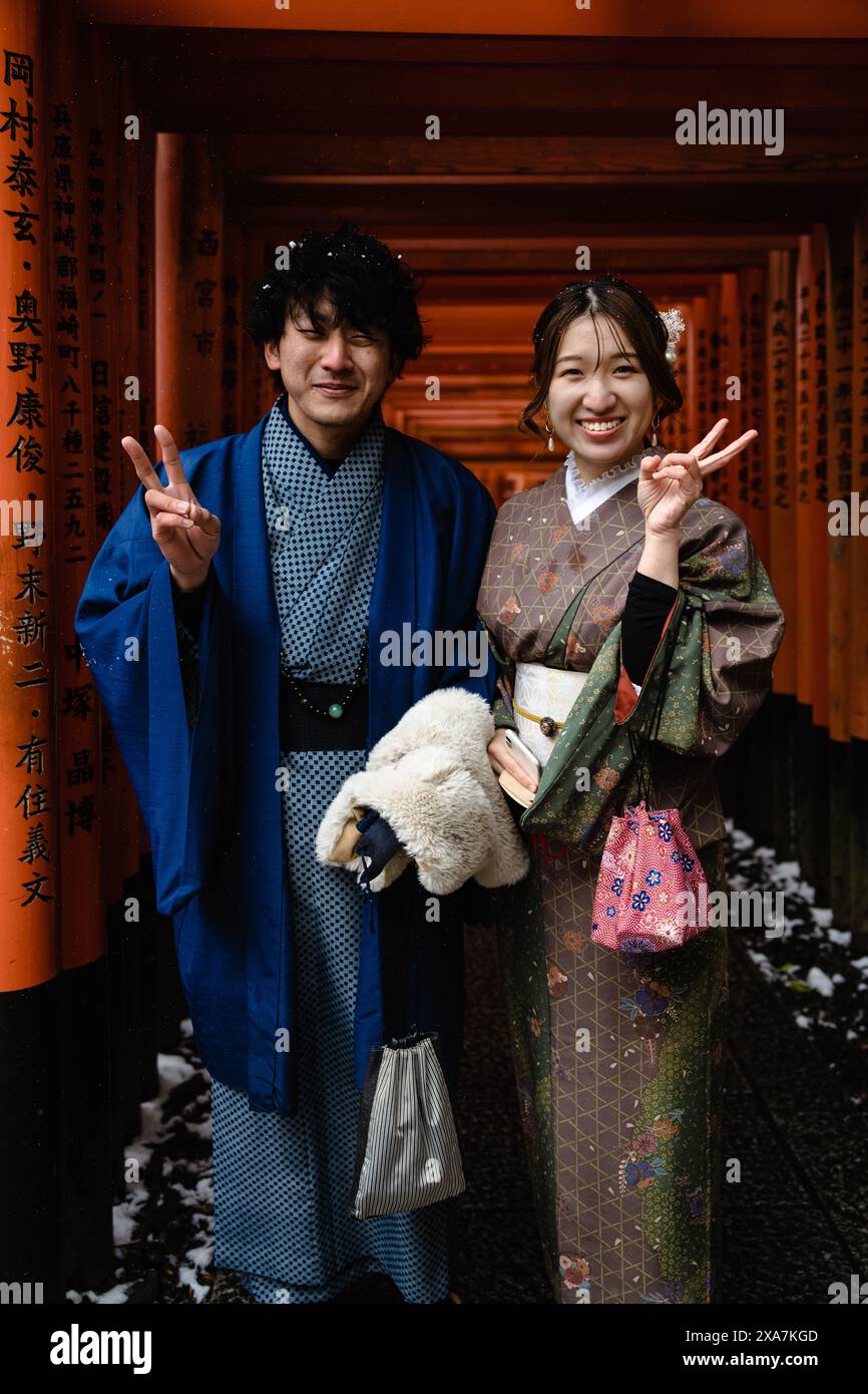 The Japanese people at Ancient style traditional Japanese torii tunnel ...