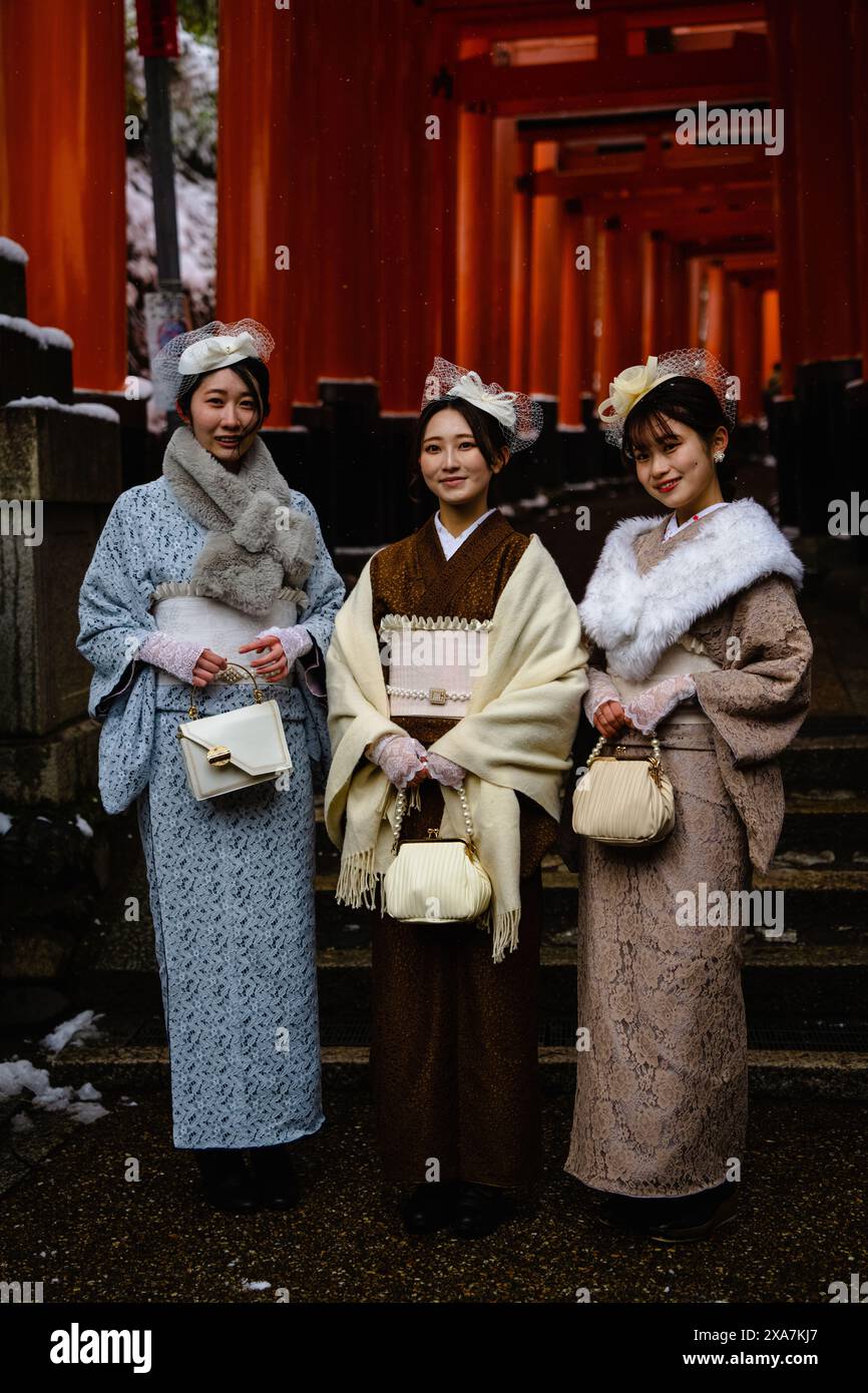 The Japanese people at Ancient style traditional Japanese torii tunnel ...