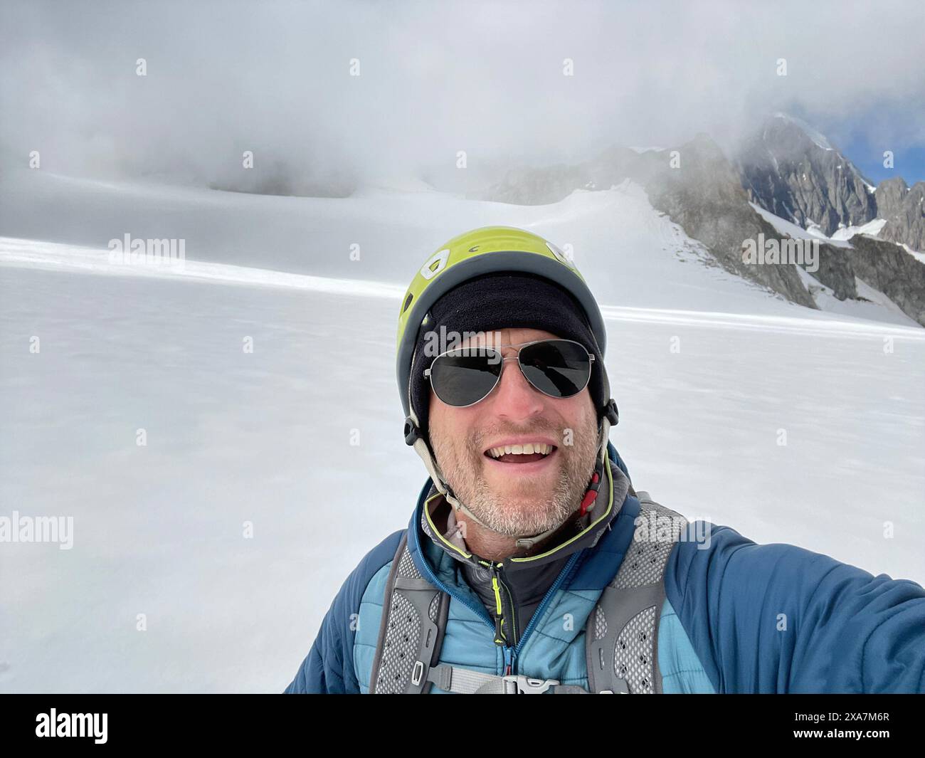 A skier capturing selfie atop snowy peaks in France Apls Stock Photo ...