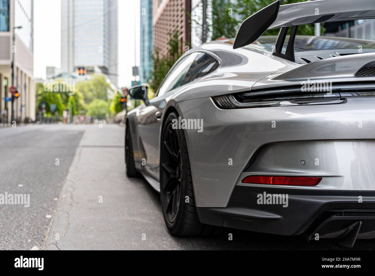 Low angle rear view of a Porsche 991 GT3 in the 992 generation on the ...