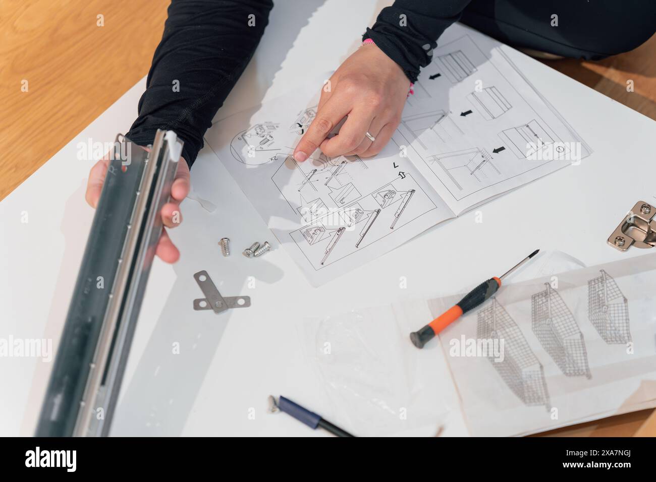 Woman hands assembling hi-res stock photography and images - Alamy