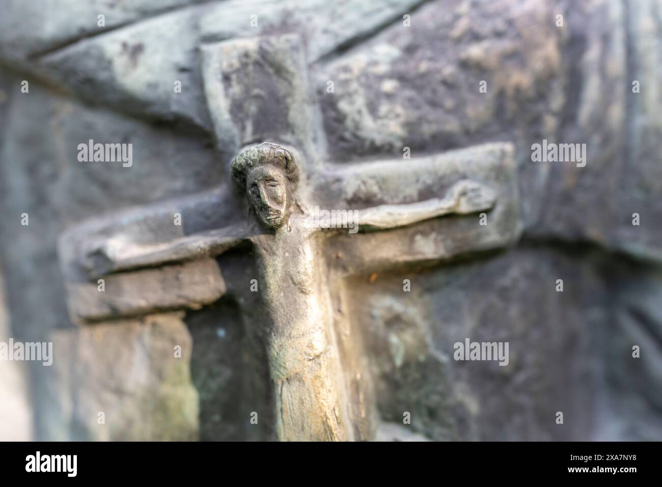 A Statue of Jesus on a cross on carved on the stone Stock Photo - Alamy