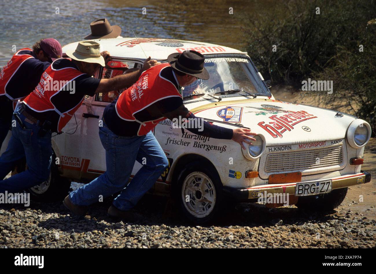 East German Trabant rally car being pushed by safety marshals, world ...