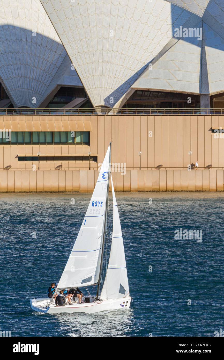 A sailing boat on Farm Cove in Sydney Harbour at Sydney Opera House in ...