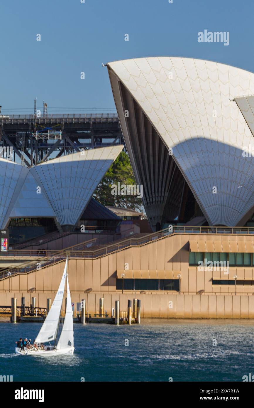 A sailing boat on Farm Cove in Sydney Harbour at Sydney Opera House in ...