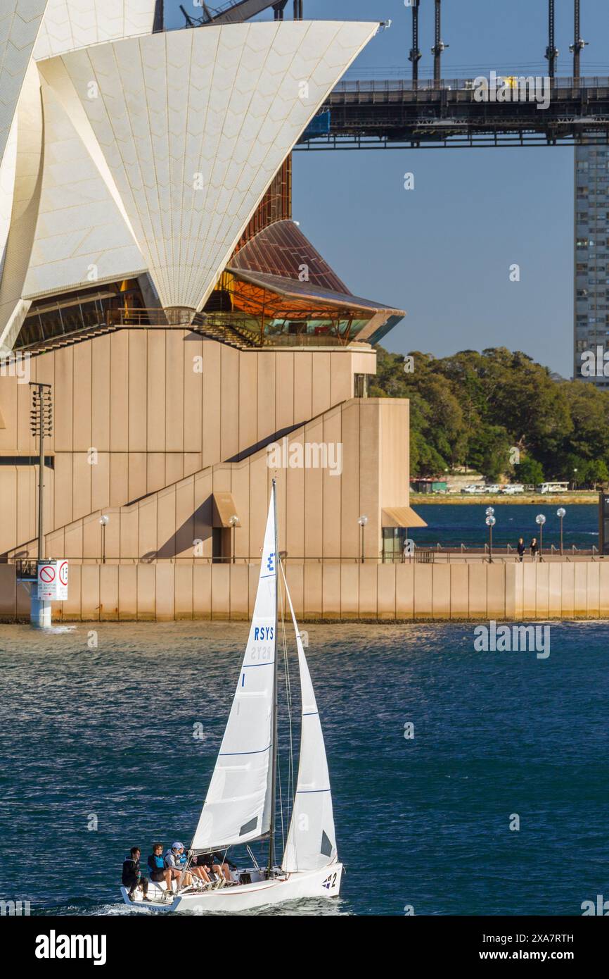 A sailing boat on Farm Cove in Sydney Harbour at Sydney Opera House in ...