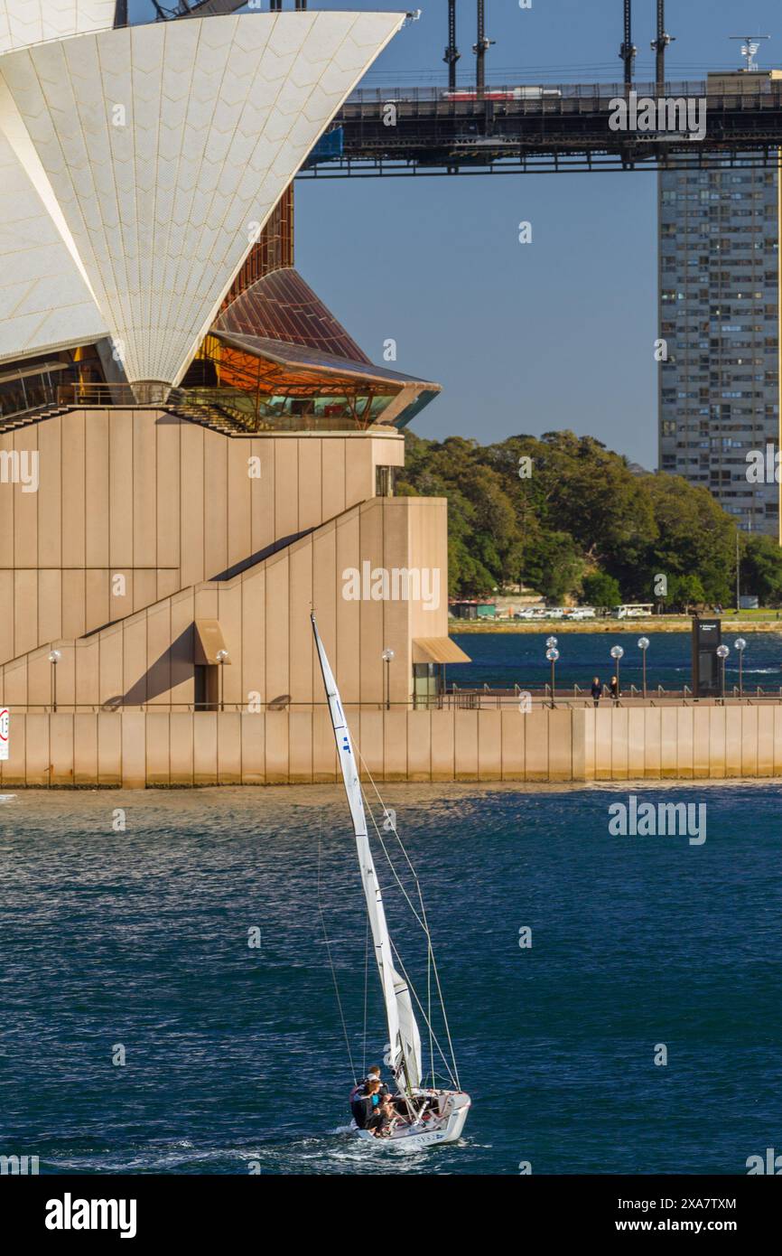 A sailing boat on Farm Cove in Sydney Harbour at Sydney Opera House in ...
