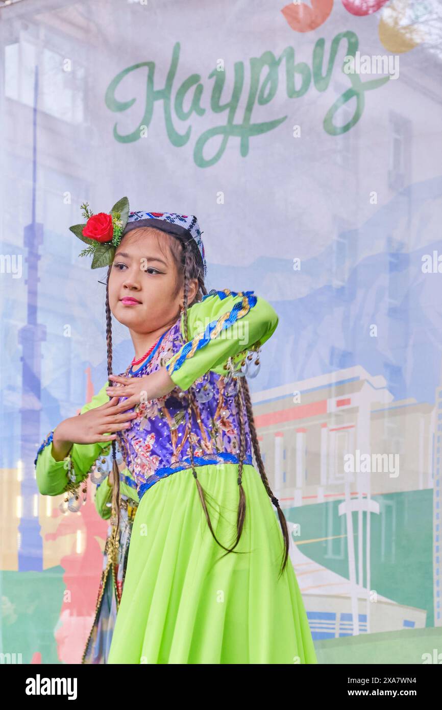 Almaty, Kazakhstan - March 21, 2024: Cute Asian small girl in national ...