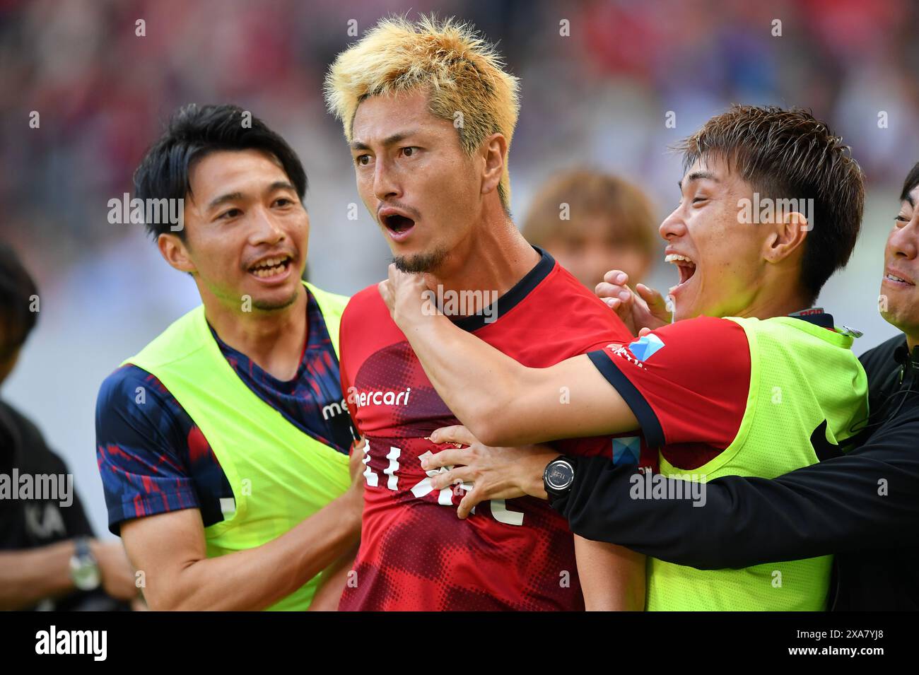 Tokyo, Japan. 1st June, 2024. Kashima Antlers' Yuma Suzuki, center ...
