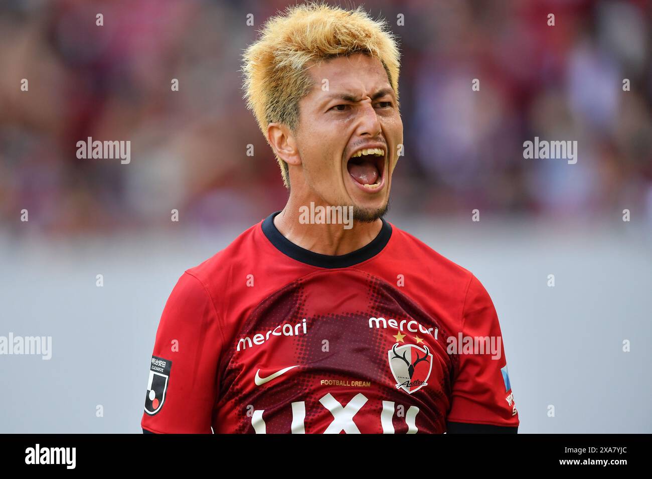 Tokyo, Japan. 1st June, 2024. Kashima Antlers' Yuma Suzuki celebrates ...