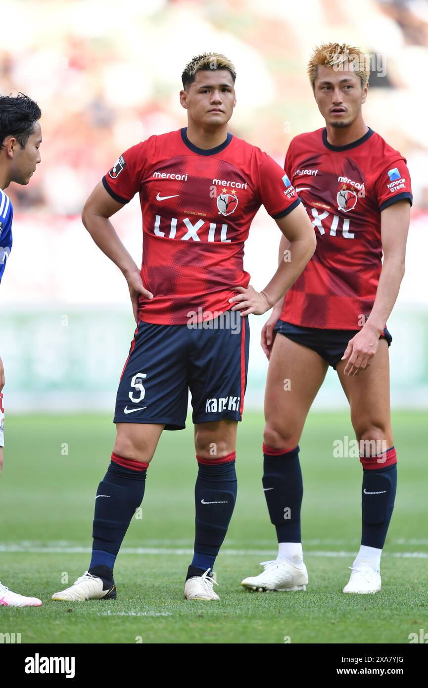 Tokyo, Japan. 1st June, 2024. Kashima Antlers' Ikuma Sekigawa, left ...