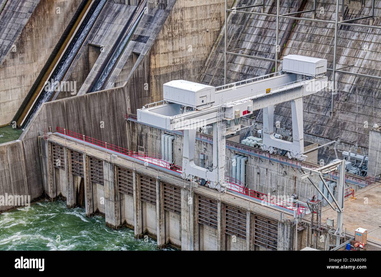 A 380-ton Gantry crane positioned over the powerhouse lifts and lowers ...