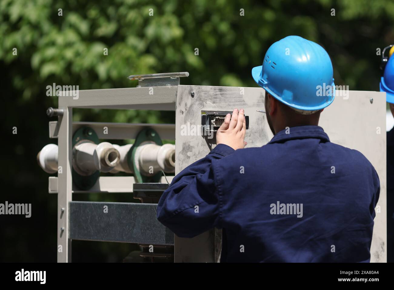 Professional electrician engineer working power hi-res stock ...