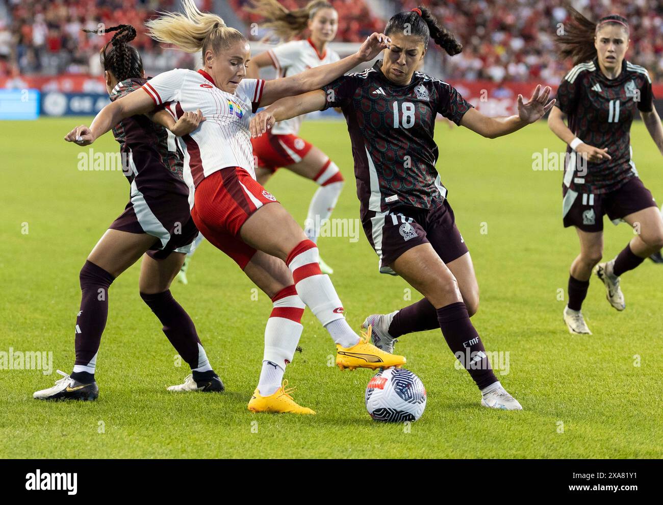 Toronto, Canada. 4th June, 2024. Adriana Leon (2nd L) of Canada vies ...