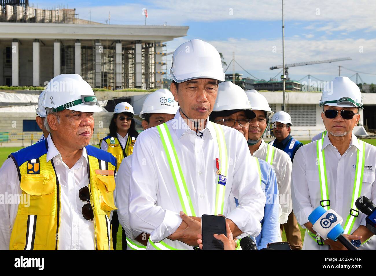 In this photo released by Indonesian Presidential Palace, Indonesian ...