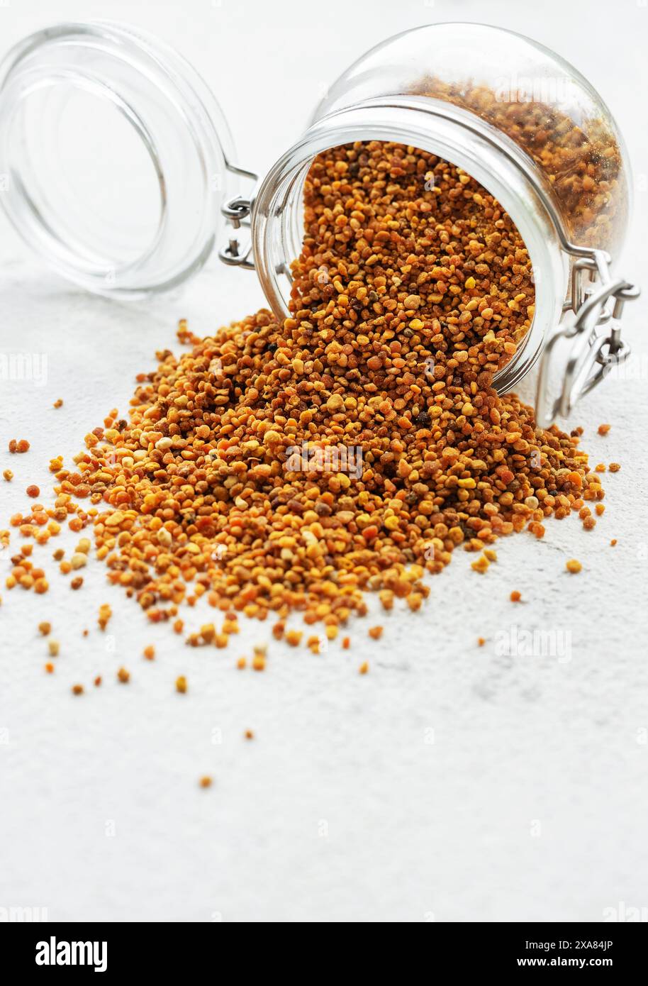 Healthy bee pollen grains. Bee pollen on a glass jar Stock Photo - Alamy