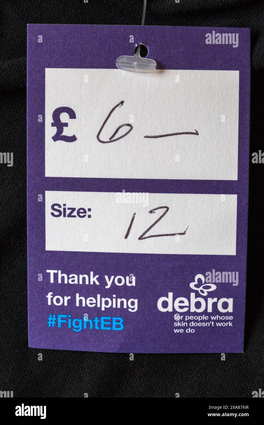 Thank you for helping label tag on garment bought from debra charity ...