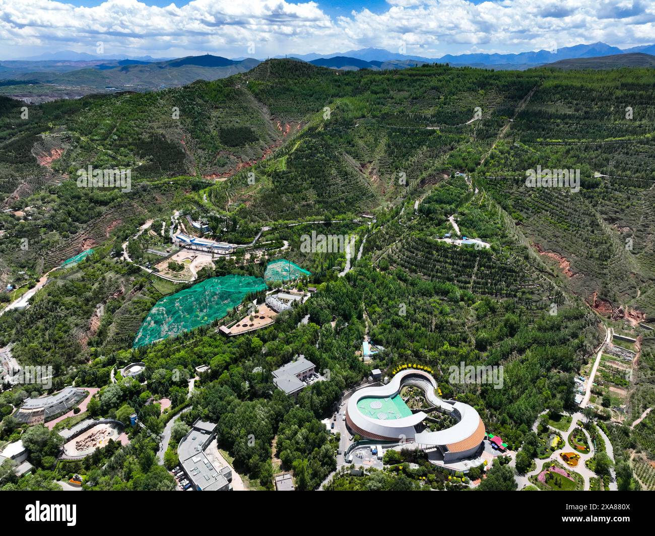 (240605) -- XINING, June 5, 2024 (Xinhua) -- An aerial drone photo ...