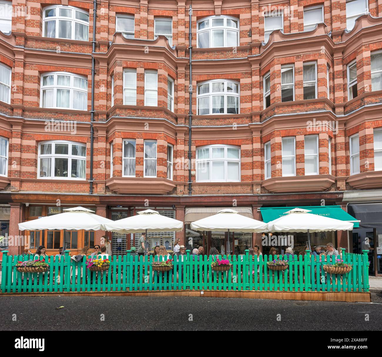 Outdoor restaurant in front of Abbots Court, an expensive, luxury ...
