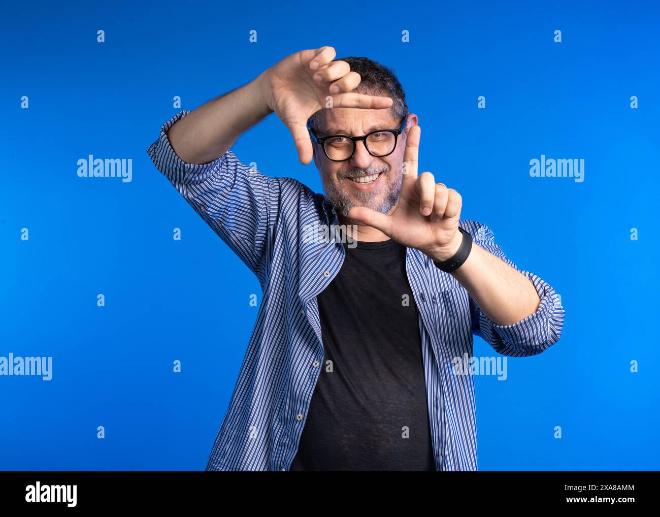 Adult man making a framing gesture with his hands - expressing ...