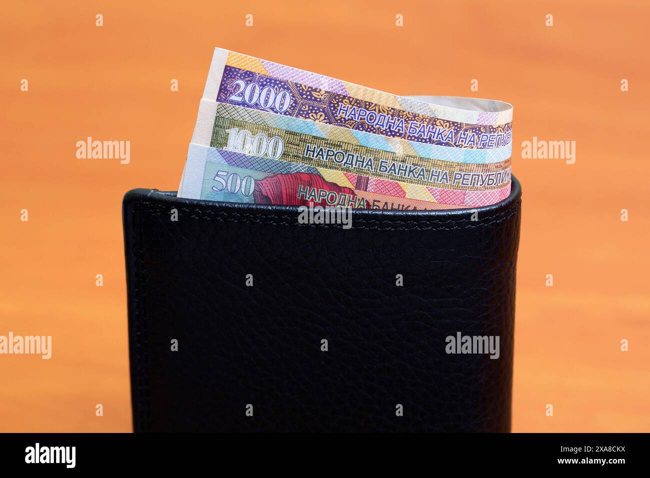 Macedonian money - denar in the black wallet Stock Photo - Alamy