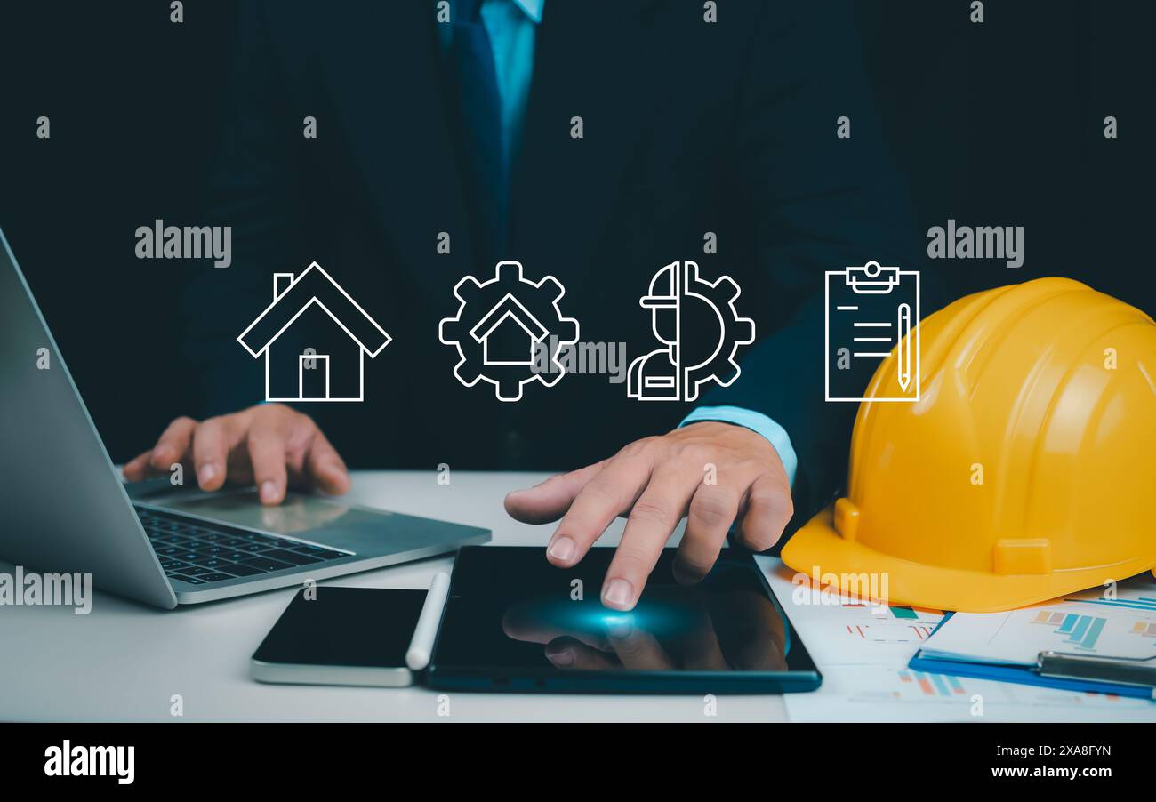 Architect Or Engineer Using Tablet To Work On Table Cost Calculation