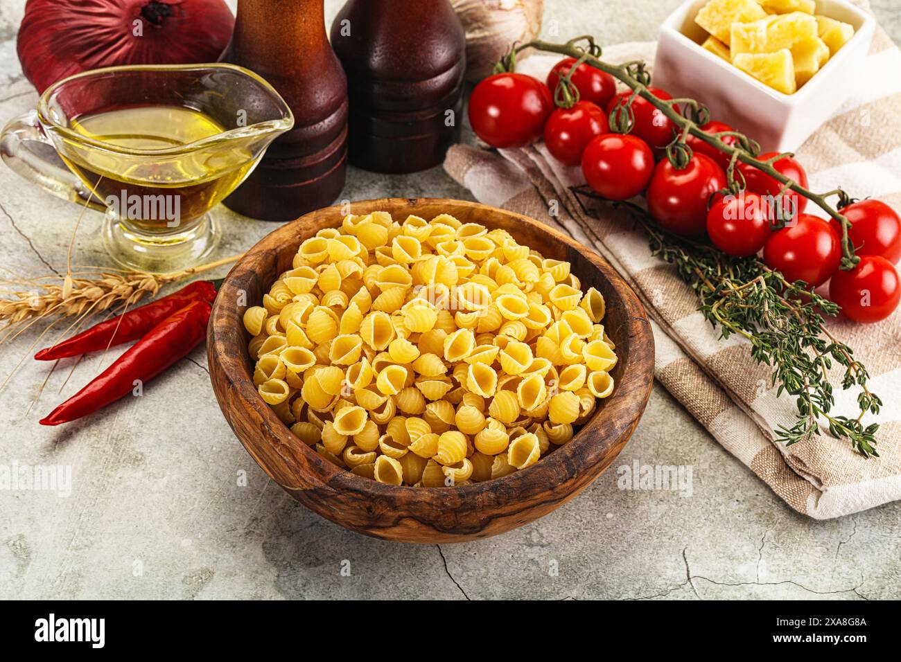 Italian cuisine - dry conchiglie shell pasta Stock Photo - Alamy