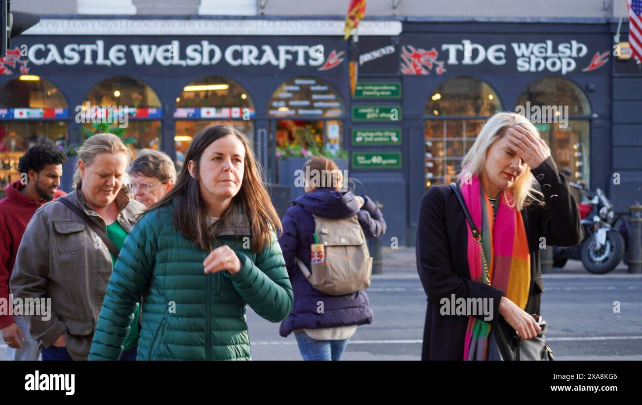 Cardiff, Wales. Oct 29 2023: Visitors and tourist walk towards Cardiff ...