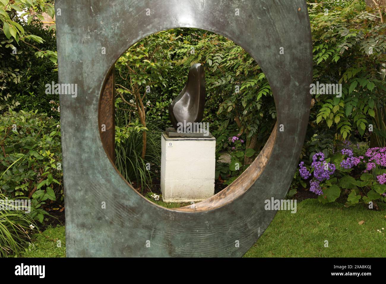 Barbara Hepworth Sculpture Garden, Coré 1960 cast bronze seen through a ...