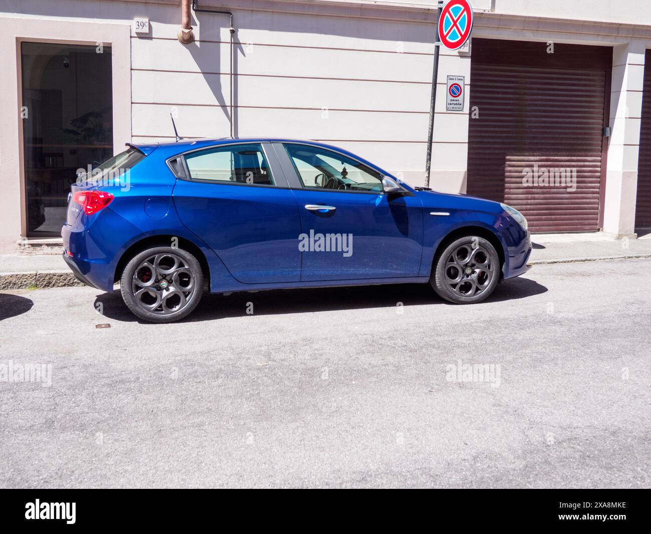 Cremona, Italy - May 27th 2024 Blue alfa romeo giulietta parked on a ...