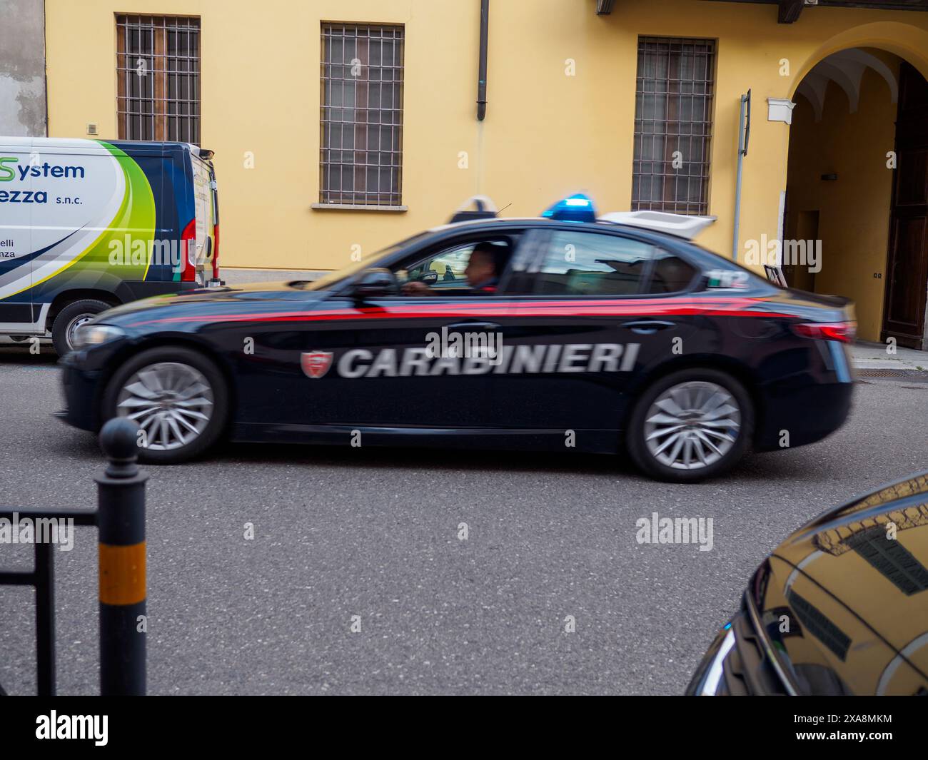Cremona, Italy - May 27th 2024 Carabinieri car speeds through a city ...