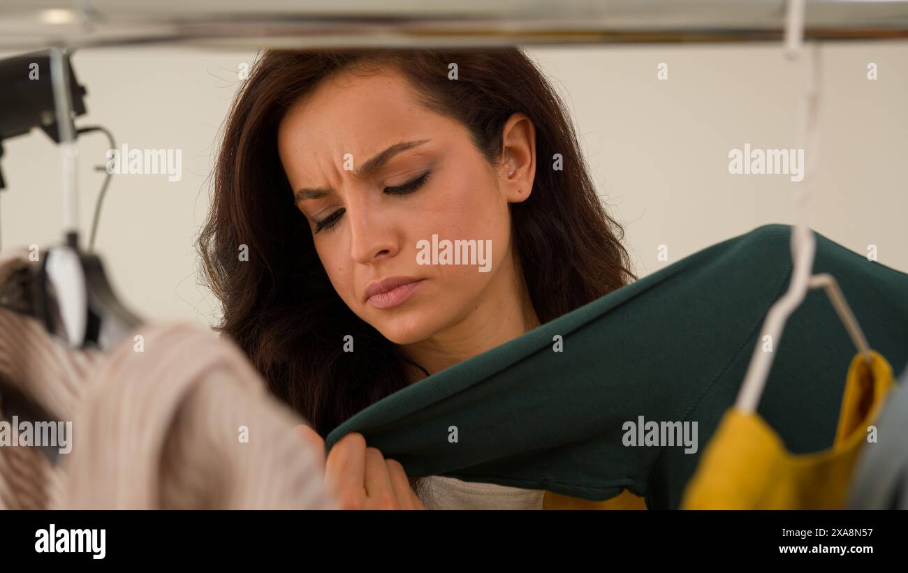 Dissatisfied irritated Caucasian woman vlogger model influencer frown ...