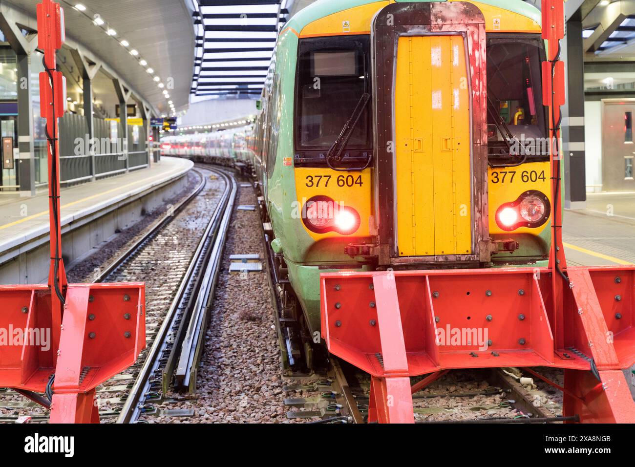 Single southern railway train next to buffer stop about to depart from ...
