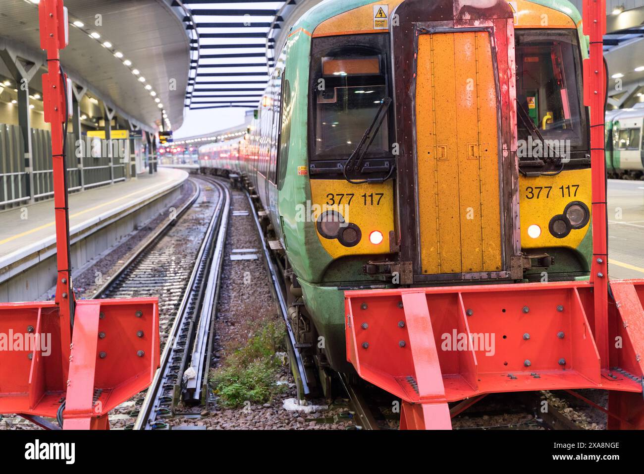 Single southern railway train next to buffer stop about to depart from ...