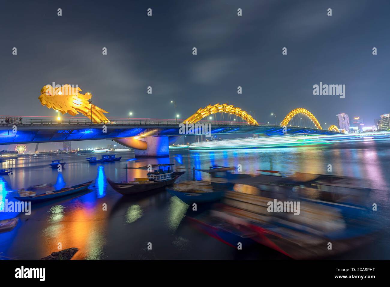 Dragon River Bridge and administrative center building at night, the ...